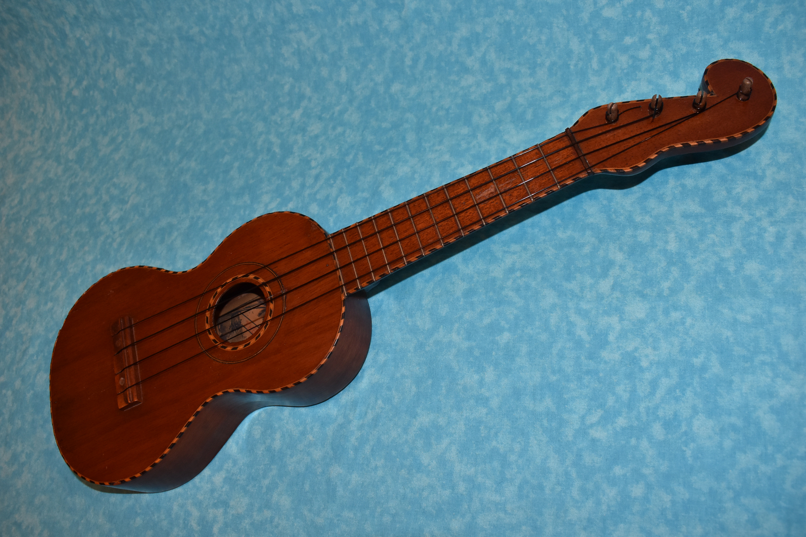 The Mele Scroll Headstock B&J New York